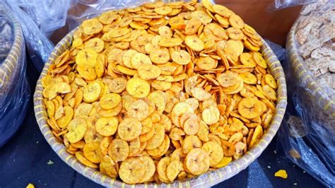 Freshly Fried Cassava Chips Are Collected On A Tampah And Look Crispy