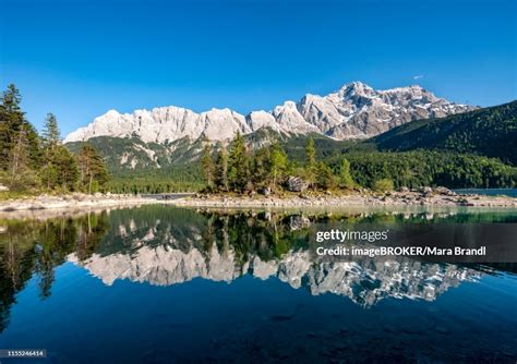 Lake Eibsee With Sasseninsel And Zugspitze Water Reflection Wetterstein