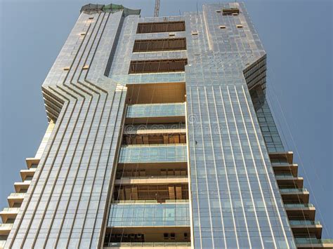 Glass Covered Multi Storied Office Building Behind The 30 Feet High Elevated Mono Rail Lower