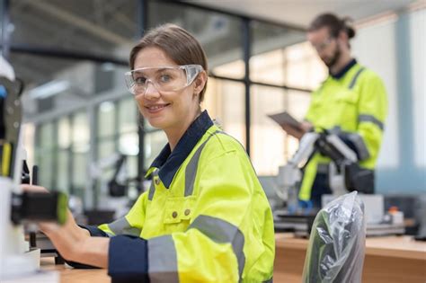 Premium Photo Female Engineer Training Design And Programmable Ai Robot Model In Academy