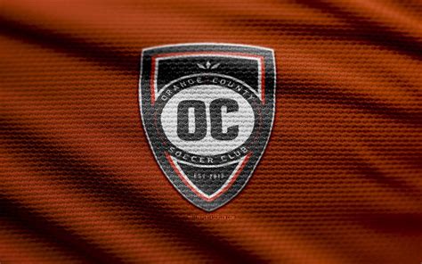 다운로드 오렌지 카운티 Sc 패브릭 로고 4k 오렌지 직물 배경 Usl 챔피언십 보케 축구 오렌지 카운티 Sc 로고