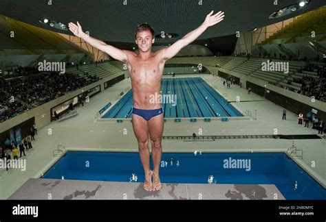 British Olympic Diver Tom Daley Performs A Dive Into The New Aquatic