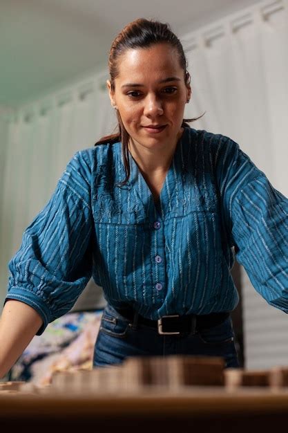 Premium Photo Portrait Of Beautiful Woman Standing On Table