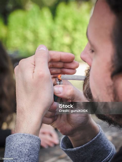 Man Lighting Up Joint Marihuana Joint Cigarette Closeup Detail View