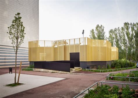 Cut Architectures Adds Golden Walls To A Community Centre