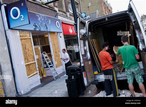 The Aftermath Of The Previous Nights Looting People Volunteer To Help