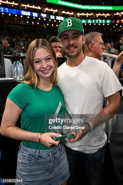 Brianna Wakefield Poses For A Photo With The Hero Among Us Award In