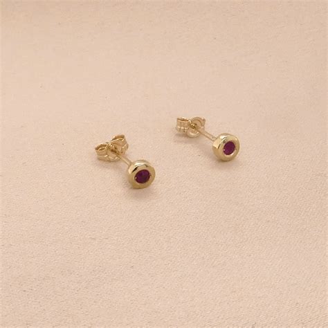 Opulent Small Simple Flat Circle Ruby Studs Clarity