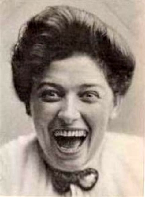 A Victorian Woman Smiling And Goofing Around While Taking Photos From