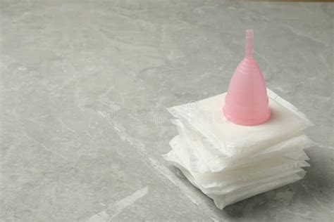 Menstrual Cup And Pads On Grey Table Space For Text Stock Image Image Of Bleeding Genital