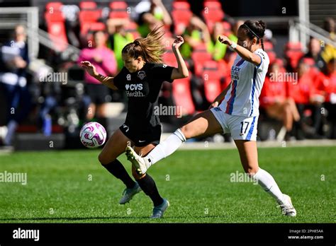 Washington Spirit Midfielder Ashley Sanchez Defends A Kick From Ol
