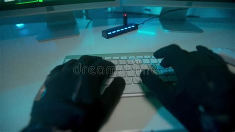 Hacker Stretching Hands In Black Gloves And Typing On A Computer Keyboard Hacking Password