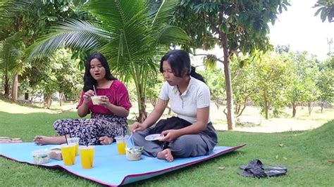 Teenage Girls Enjoying Juice Picnic Under Shady Trees Stock Video Video Of Garden Grass