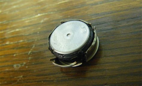 Ibutton After Four Cuts Were Made To The Casing Note The Partially Download Scientific Diagram