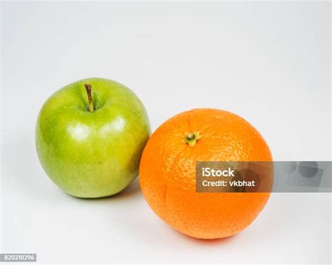 Perbandingan Apel Dan Jeruk Foto Stok Unduh Gambar Sekarang Amerika