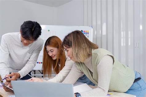 Collaborative Ux Ui Design Team Working On Creative Project In Modern Office Environment Stock