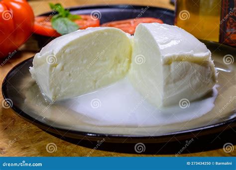 White Ball Of Italian Soft Cheese Mozzarella Di Bufala Campana Served