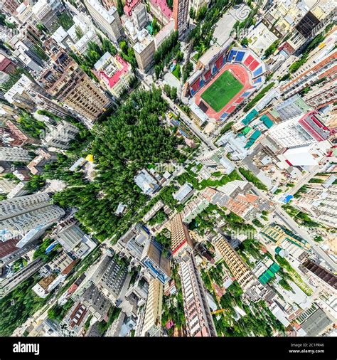 Aerial City View With Crossroads And Roads Houses Buildings Parks