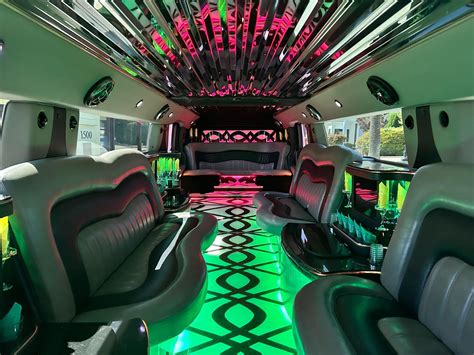 White Hummer Stretch Limo Gold Class Limo
