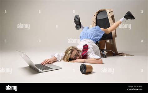 Exhausted Woman Collapsed In Unconventional Pose On Office Chair