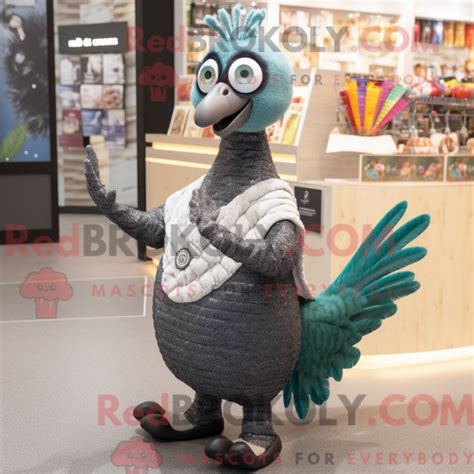 Gray Peacock Mascot Costume Character Dressed With A Sweater And Coin