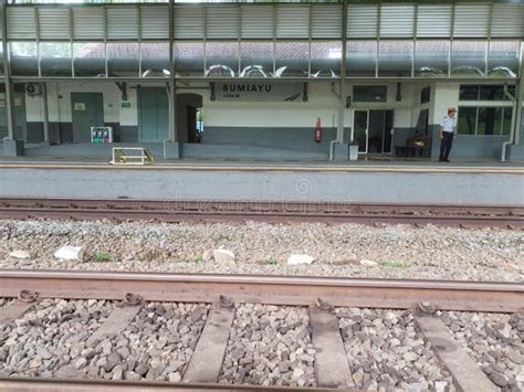 Train Tracks At The Station Editorial Photography Image Of Yellow