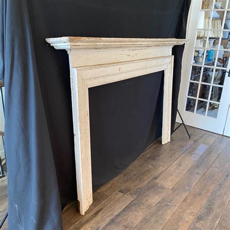 Painted White Distressed Antique Fireplace Mantel With Detailed