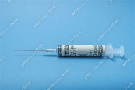 A Syringe Wrapped In A Dollar 이미지 1388546941 게티이미지뱅크