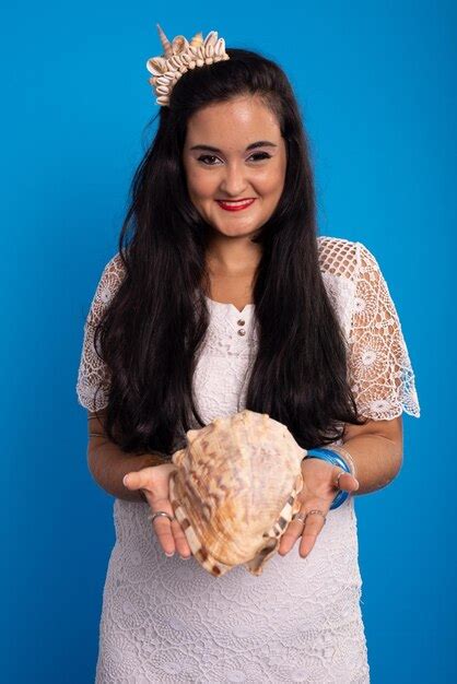 Premium Photo Beautiful Young Woman In White Dress With Shell Tiara
