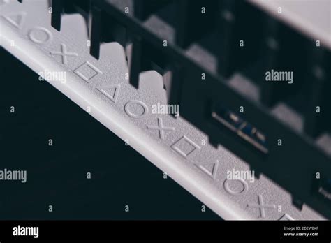 Iconic Playstation Symbols On The Back Of The Playstation 5 Gaming