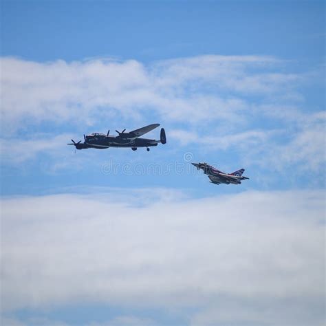 Eurofighter Typhoon Flying In Formation With A Lancaster Ww2 Bomber