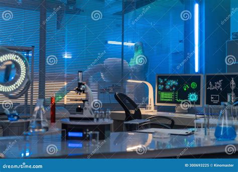 The Shot Shows A Laboratory Room With Brightly Lit Lamps And Various
