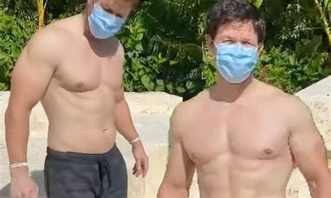 Mark Wahlberg Proudly Displays His Funky Bunch Of Abs As He Goes