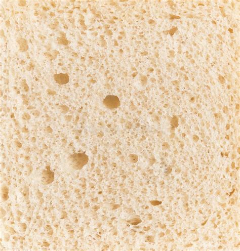 Close Up Texture Of White Bread Showing Detailed Porous Structure Suitable For Food And Baking
