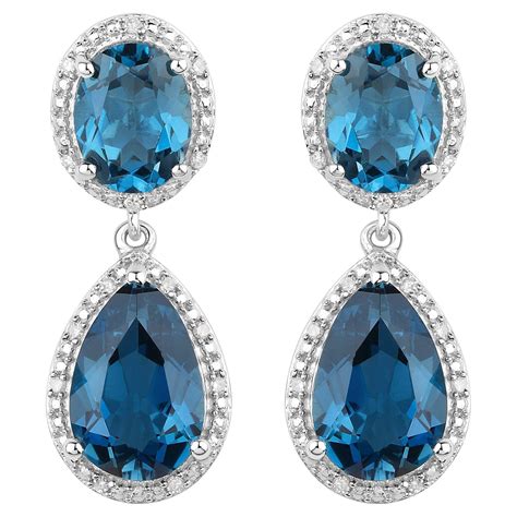 London Blue Topaz Earrings Diamond Setting 1145 Carats Total For Sale