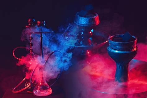 Premium Photo Modern Hookah Shisha On A Smoky Black Background With