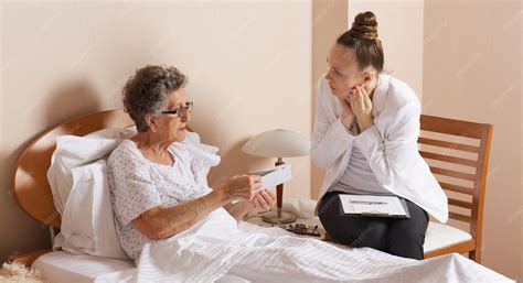 Premium Photo Visit Of Senior Social Work Assistant To An Old Woman