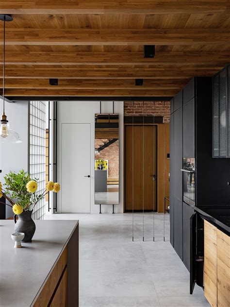 An Industrial Style Loft In Minsk Is Dressed In Black Metal And Warm Wood Elements Plain Magazine