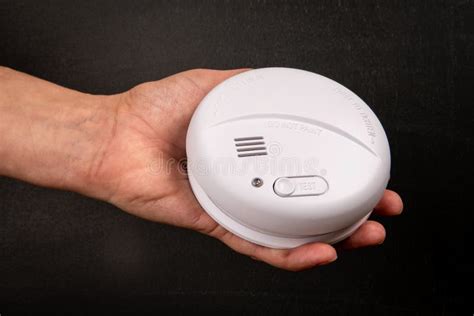 Smoke Detector In A Womans Hand Security Concept Stock Image Image