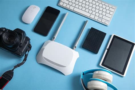 Premium Photo Wi Fi Router With A Tablet Phone Computer Keyboard And Other Objects