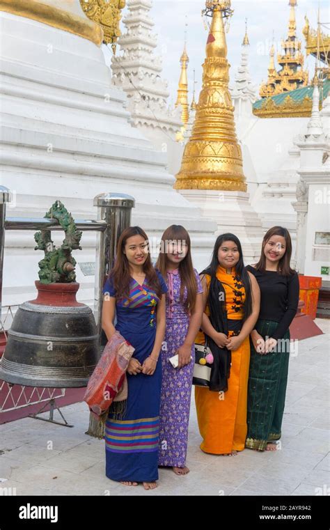 Teenage Girls At The 2500 Years Old Shwedagon Pagoda In Yangon