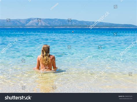 Topless Woman Sitting Water On Beautiful Foto Stok 296697629 Shutterstock