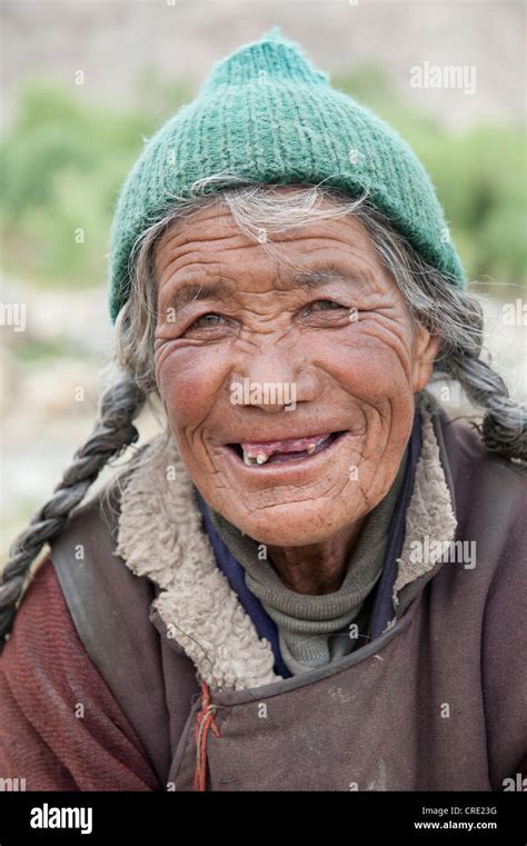 Portrait Of An Elderly Woman Full Of Joy And Missing Teeth Sakti Near