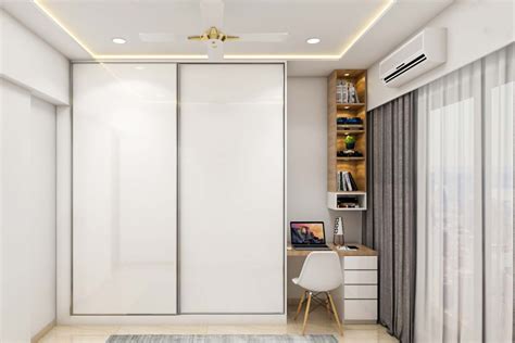 Compact Sized Modern Themed White Coloured Wardrobe Design Livspac