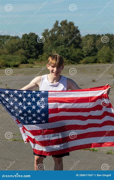 Teenage Boy Waving The American Flag Stock Image Image Of Laughing