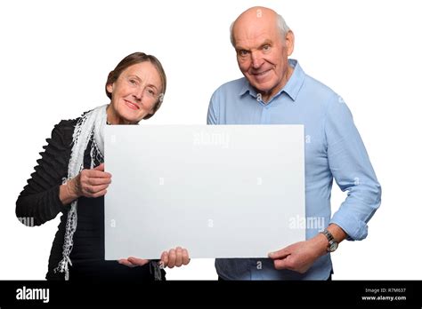 Couple Holding Canvas For Text Stock Photo Alamy