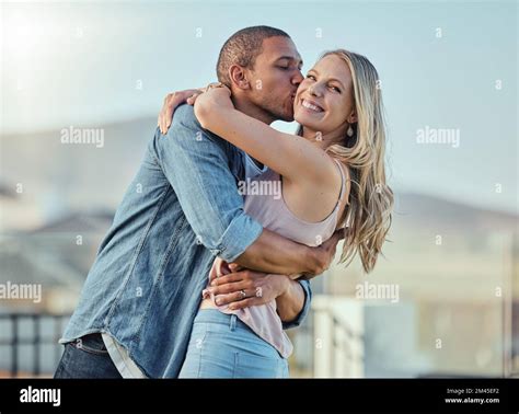 Interracial Couple Kiss And Hug Outdoor For Romance Relationship And