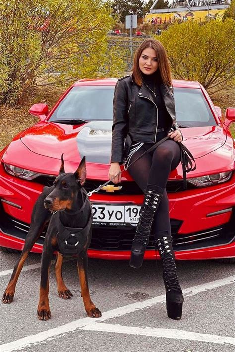 Pin by СТЕЛЛА ЛАНЕВСКАЯ on ЖЕНЩИНЫ С СОБАКАМИ | Car girl, Auto body, Girl