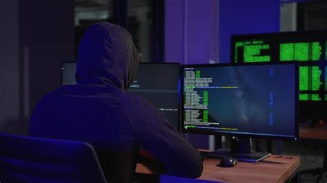 Hacker Is Using Computer For Organizing Massive Data Breach Attack On