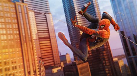 Download Spectacular Spider Man Web Slinging Across The City Wallpaper